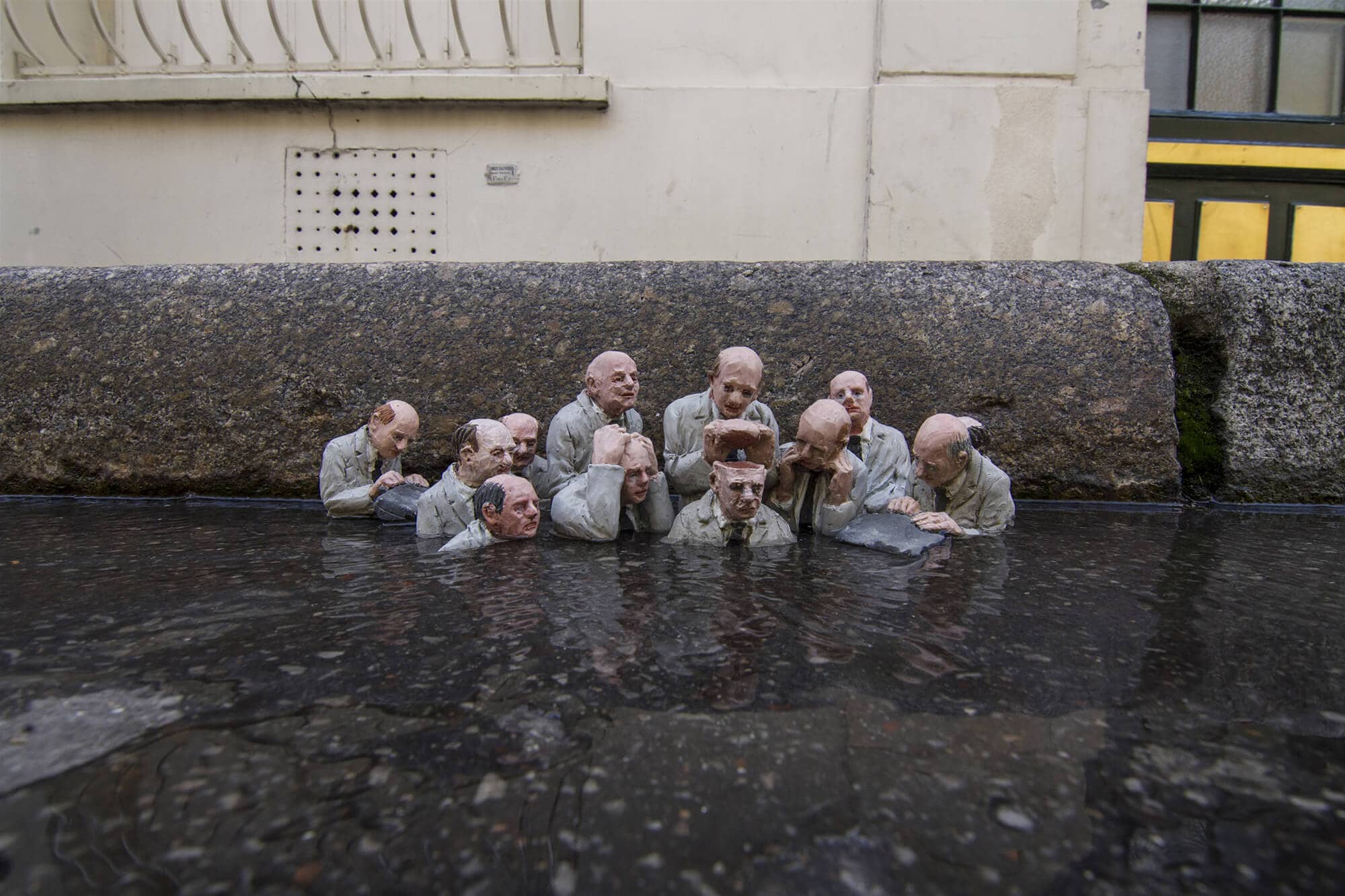 Artist Isaac Cordal Places Tiny Sculptures in Public Places | FREEYORK